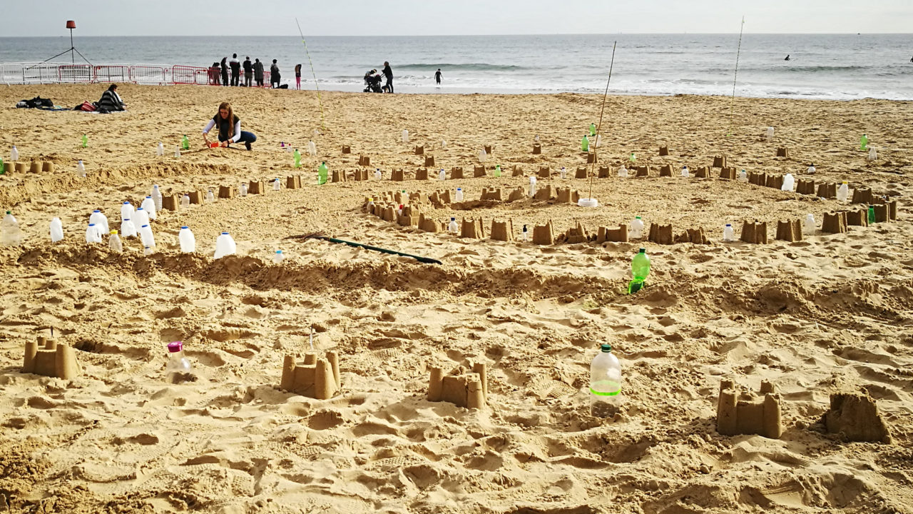 Sandcastles of the Plastic Pathways Beach labyrinth on the sand for ...